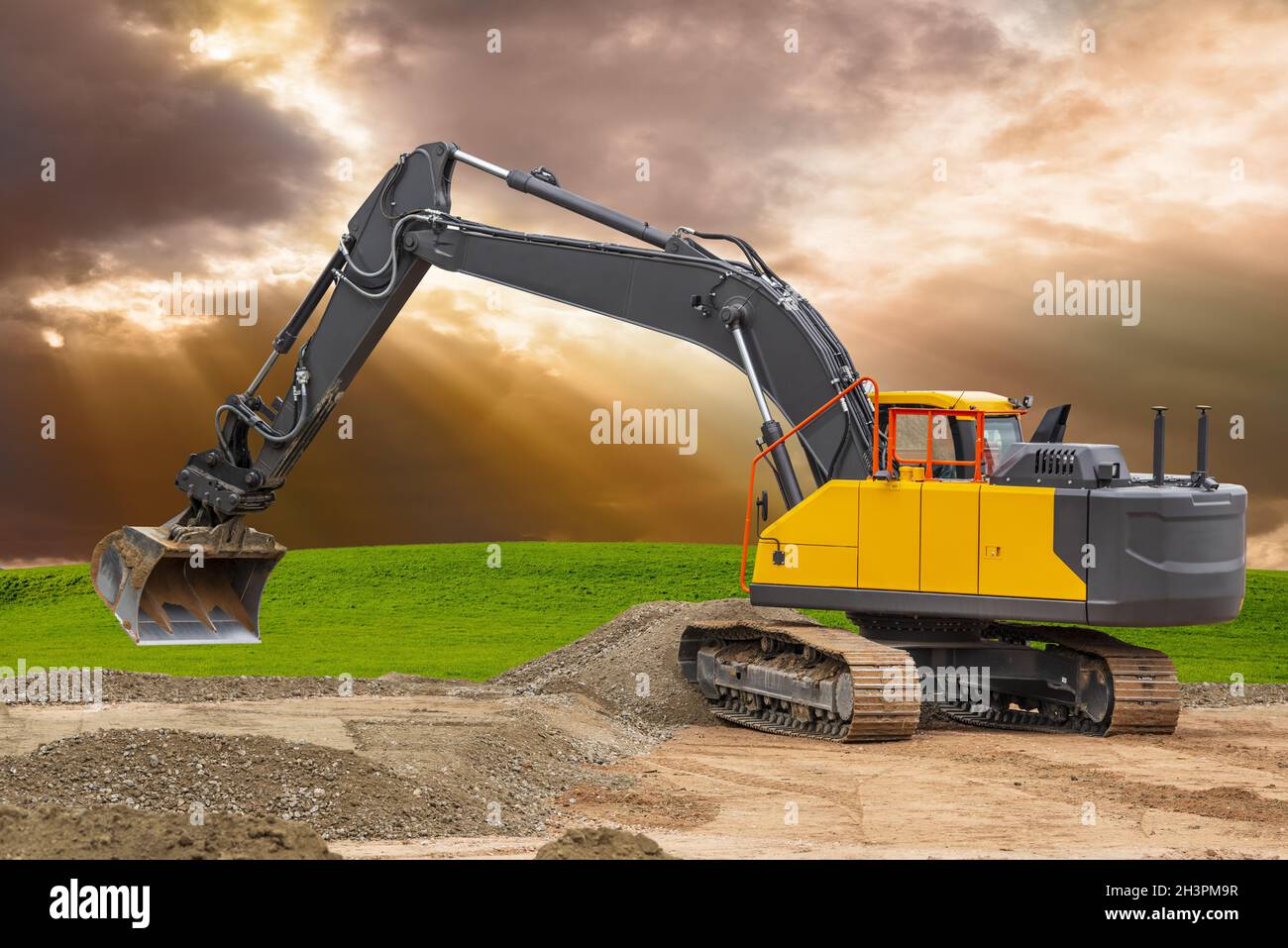 Excavator at work on construction site Stock Photo - Alamy