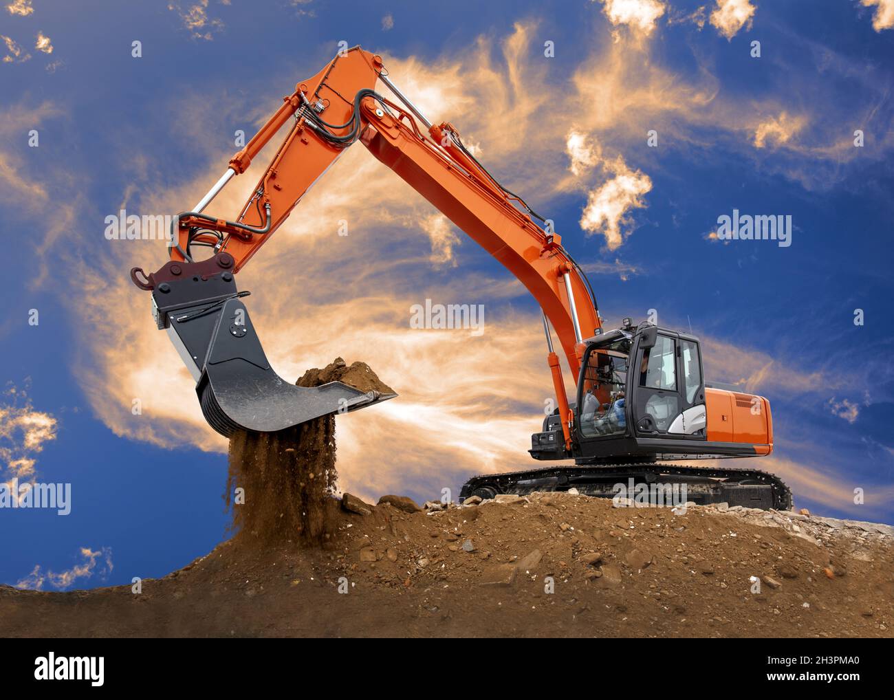 Excavator at work on construction site Stock Photo - Alamy