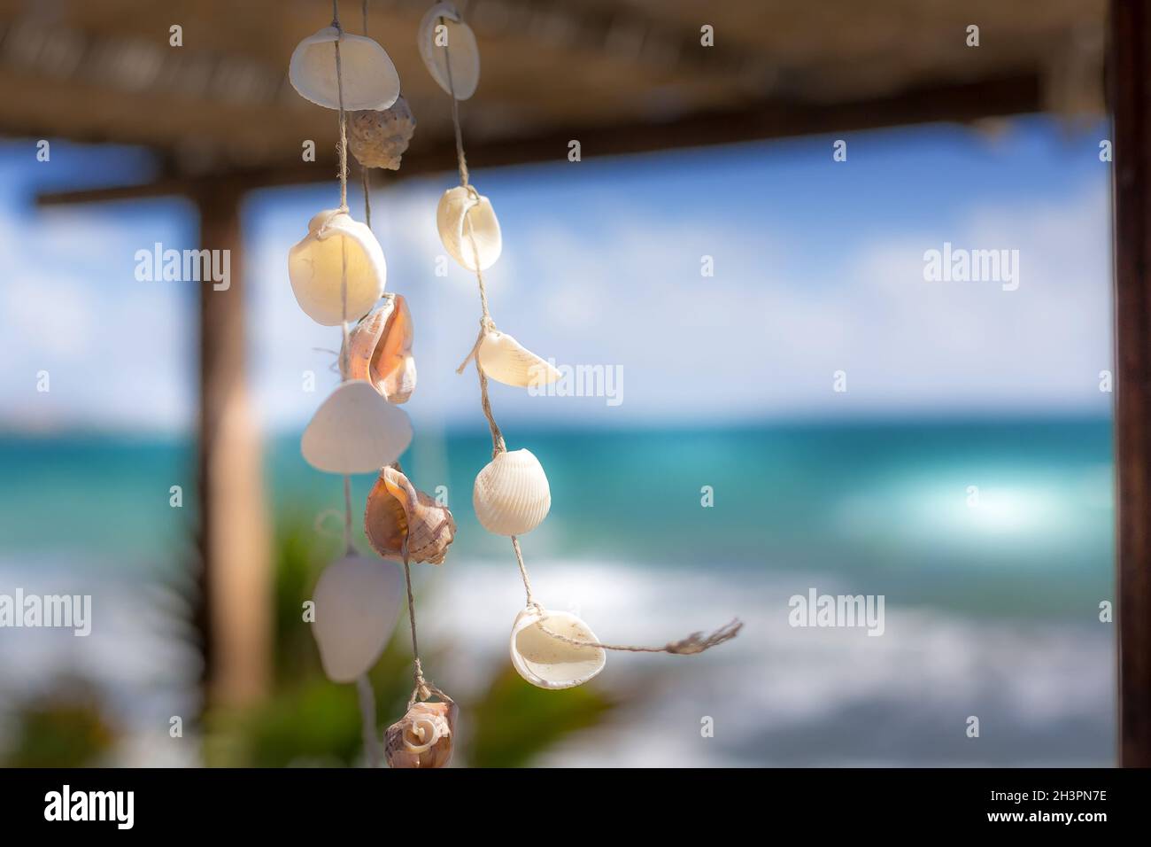 Nautical style hanging seashells decoration Stock Photo - Alamy