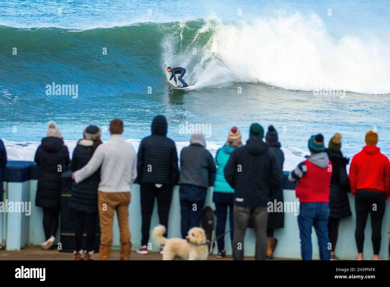 Surfing at Portrush as a big wave storm comes in off the Atlantic Ocean ...