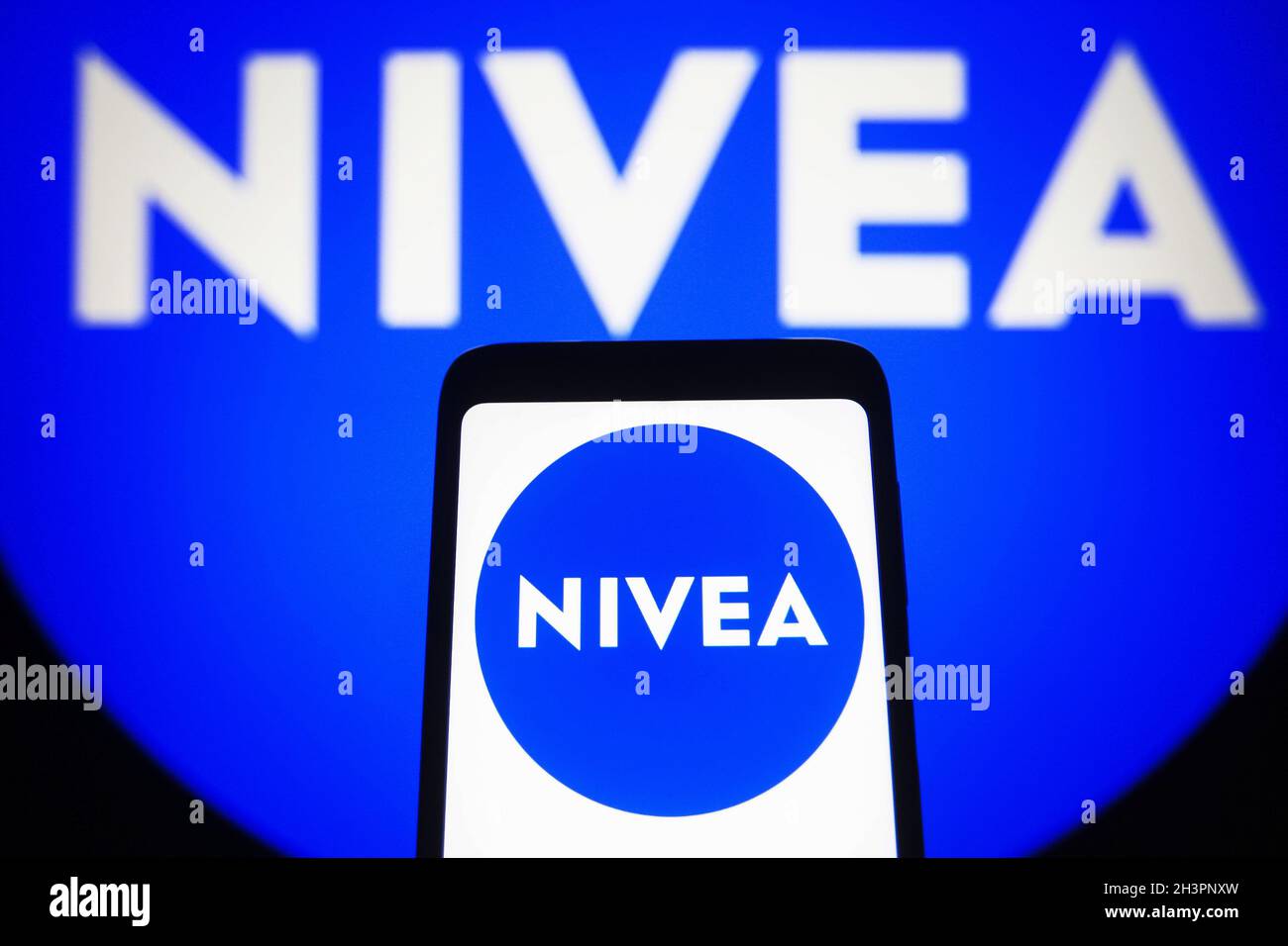 In this photo illustration, Nivea logo is seen displayed on a ...