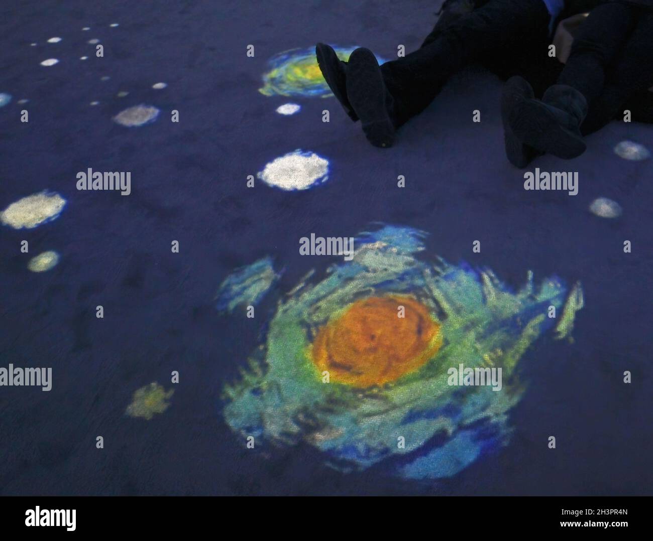 An art work seen projected on the floor during the show. Van Gogh The ...