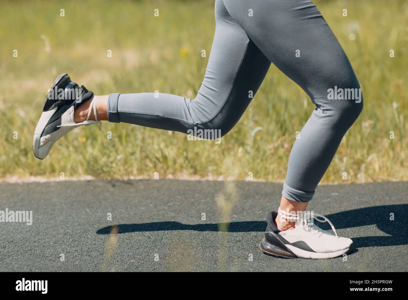 Female running legs marathon hi-res stock photography and images - Alamy