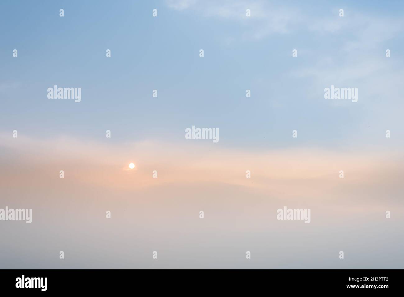 Sunset cloudy background Stock Photo - Alamy