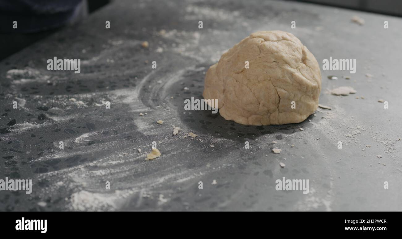 dough in process on concrete countertop, wide photo Stock Photo - Alamy