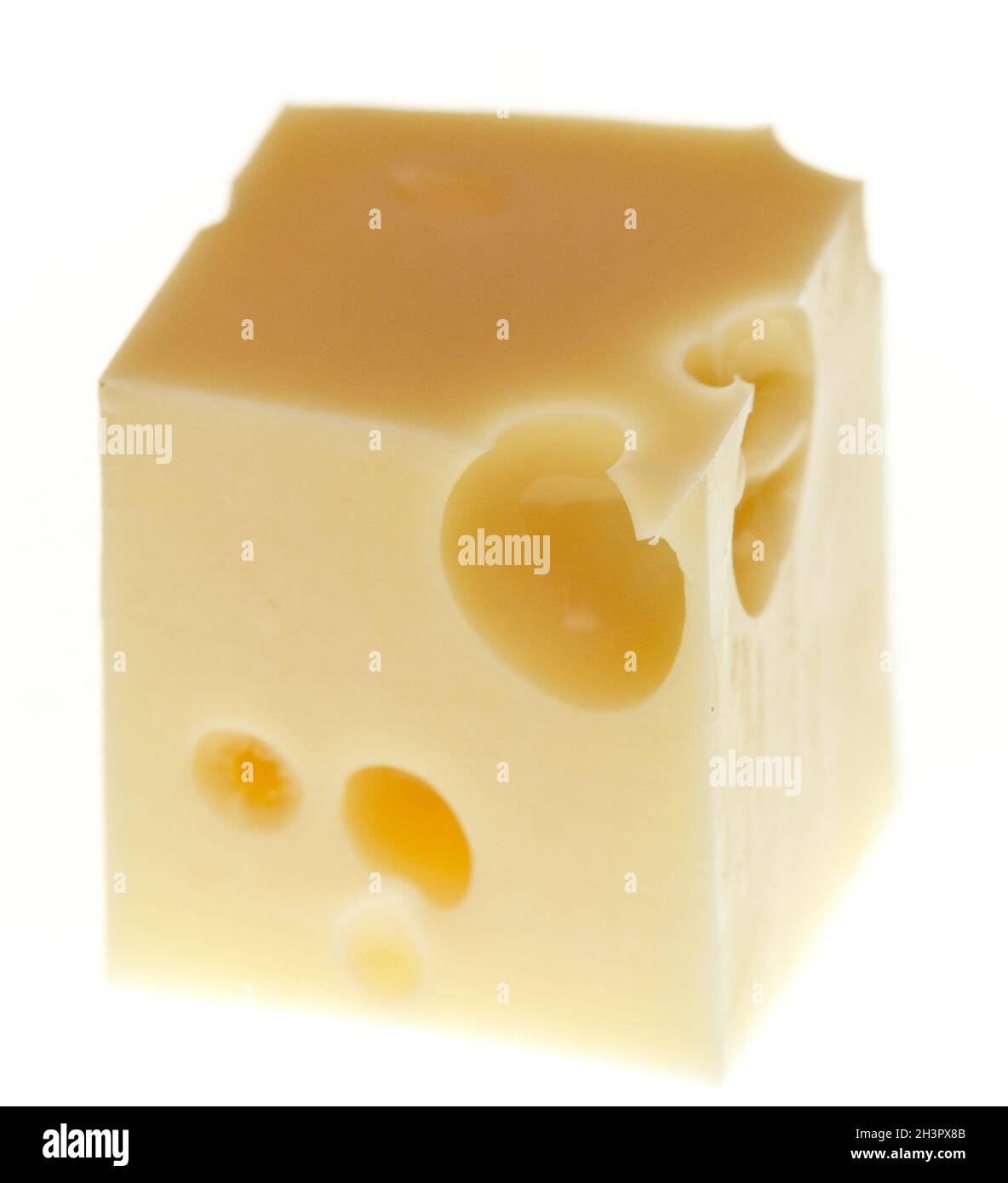 Cheese cube isolated on white background Stock Photo - Alamy