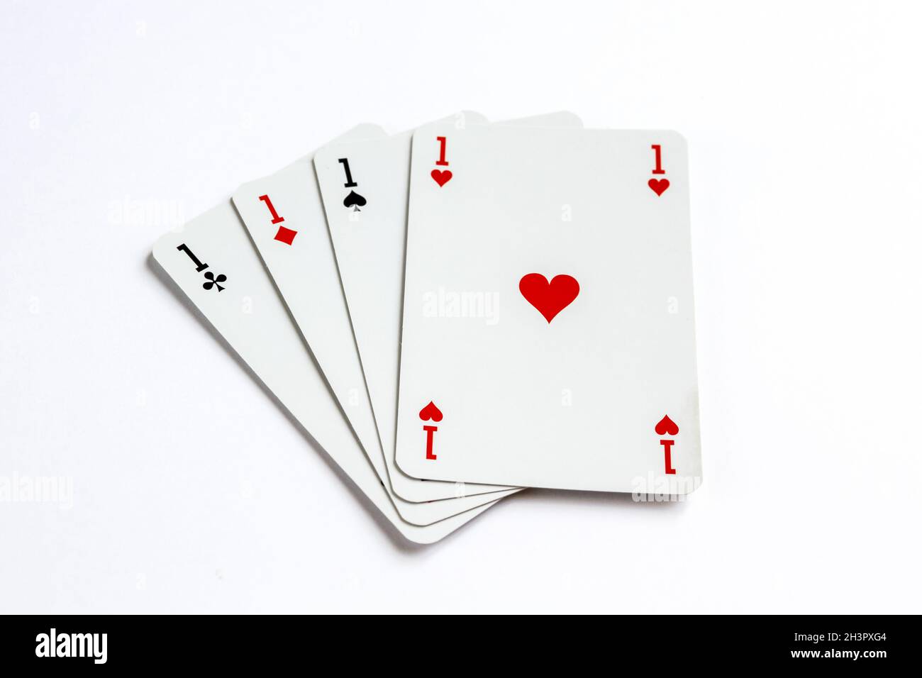 Four aces playing card game on white background Stock Photo - Alamy