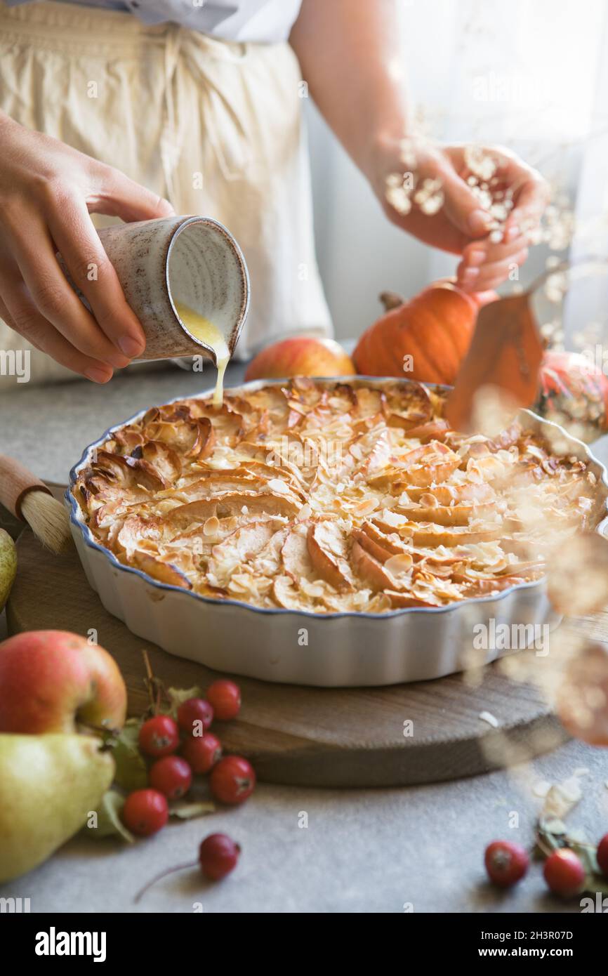 Apple pie. Piece of fresh baked homemade layered tart with fresh apples ...