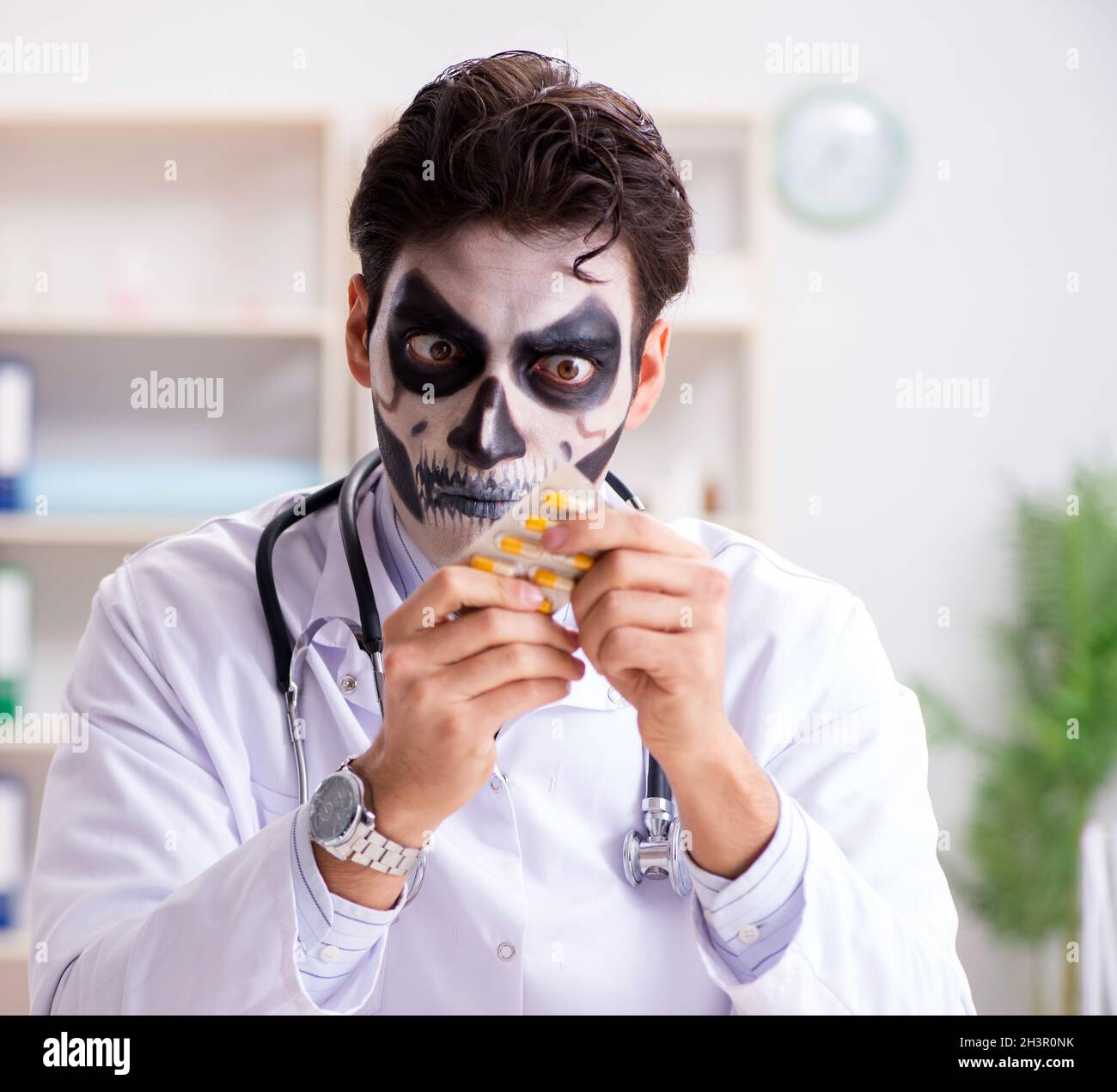 Scary monster doctor working in lab Stock Photo - Alamy