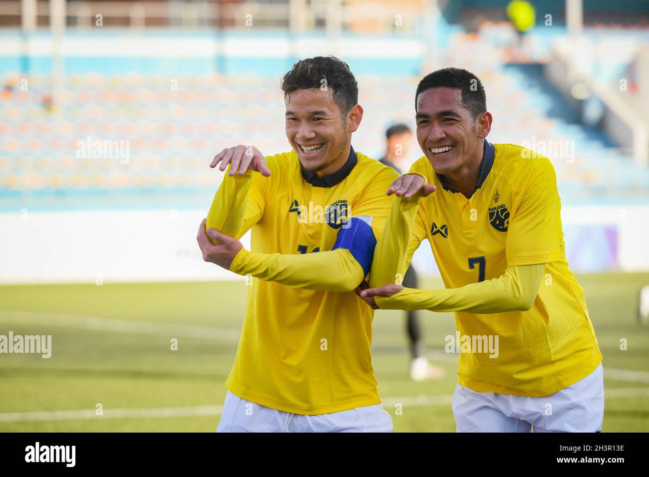 Thanawat Suengchitthawon (L) and Jakkit Palapon (R) of Thailand celebrate a goal during the AFC ...