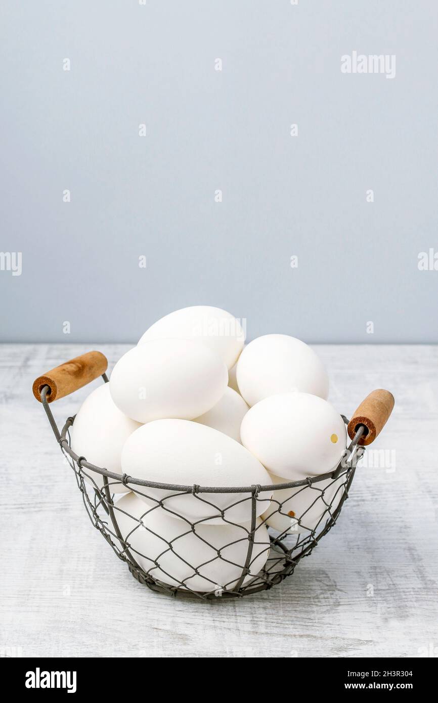 Basket of big white goose eggs. Easter time Stock Photo - Alamy