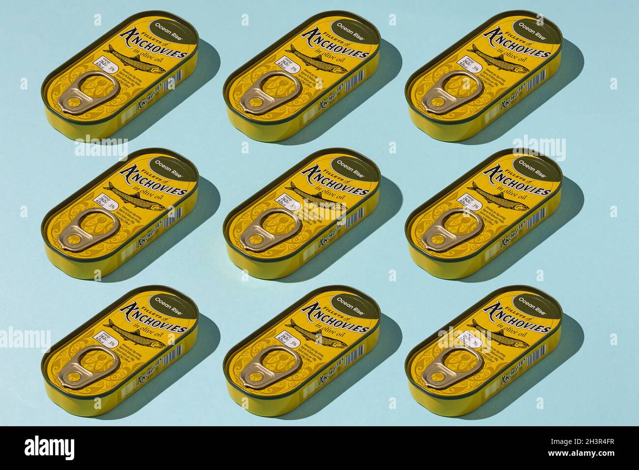 yellow tin pattern on blue paper background Stock Photo - Alamy