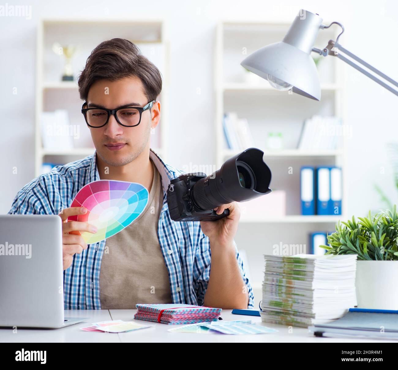 Professional freelance photographer taking photograph hi-res stock ...