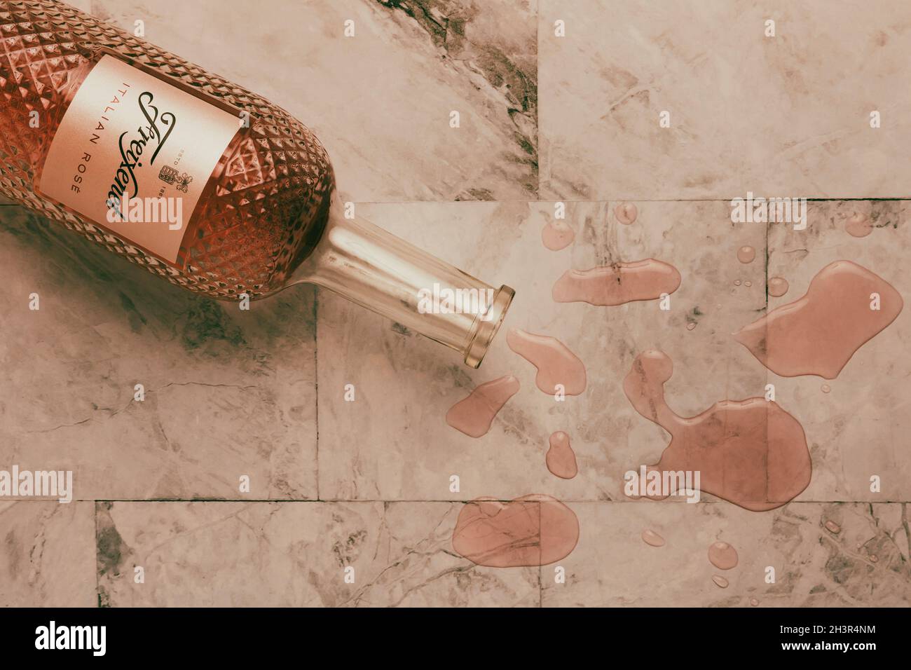 Spilled rose wine on the marble floor or kitchen worktop hi-res stock ...