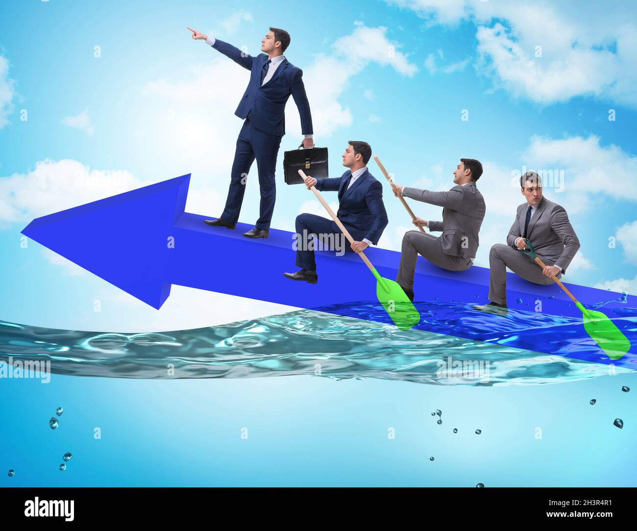 Teamwork concept with businessmen on boat Stock Photo - Alamy