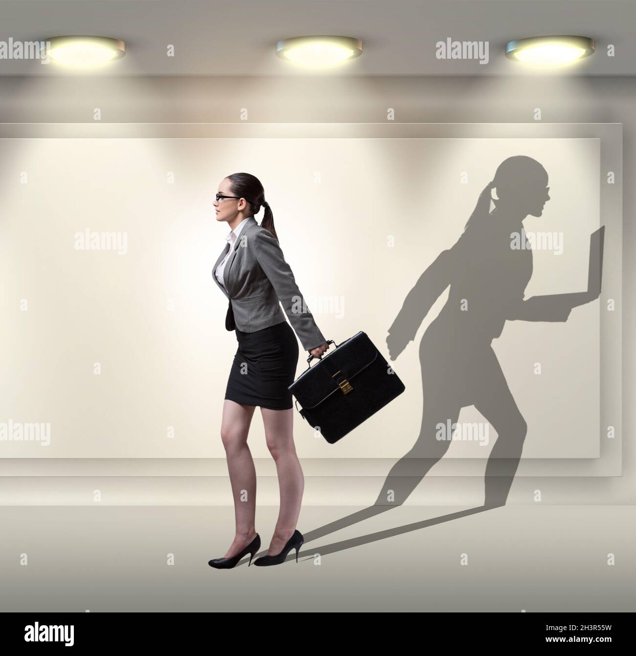 Businesswoman and his shadow in business concept Stock Photo - Alamy