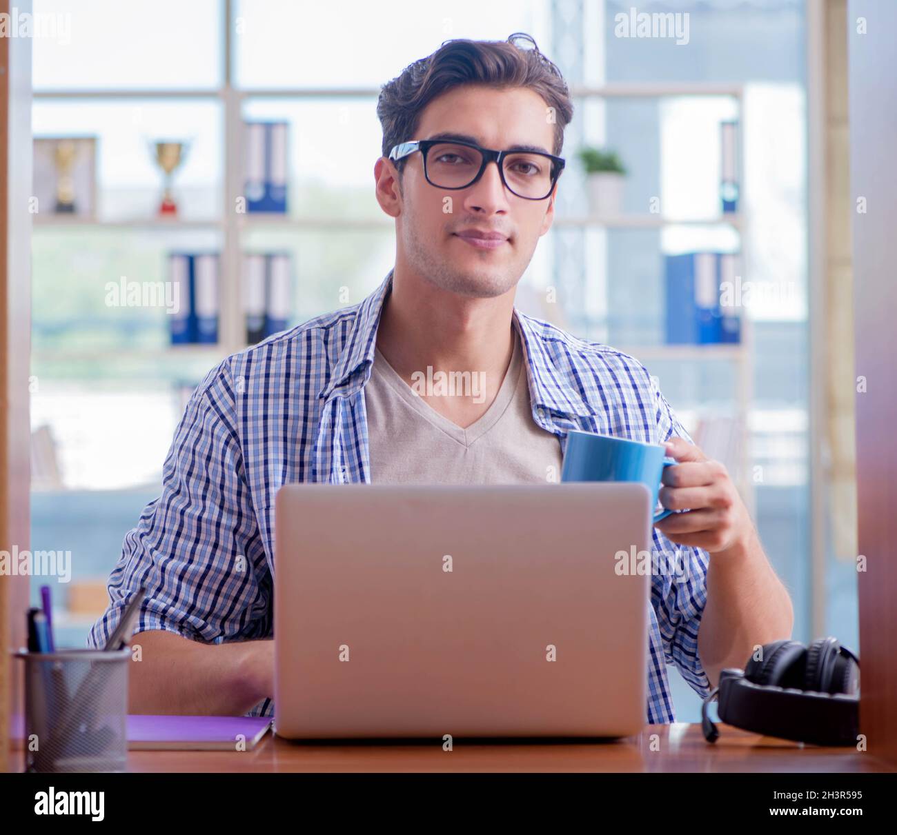 Student studying at home preparing for exam Stock Photo - Alamy