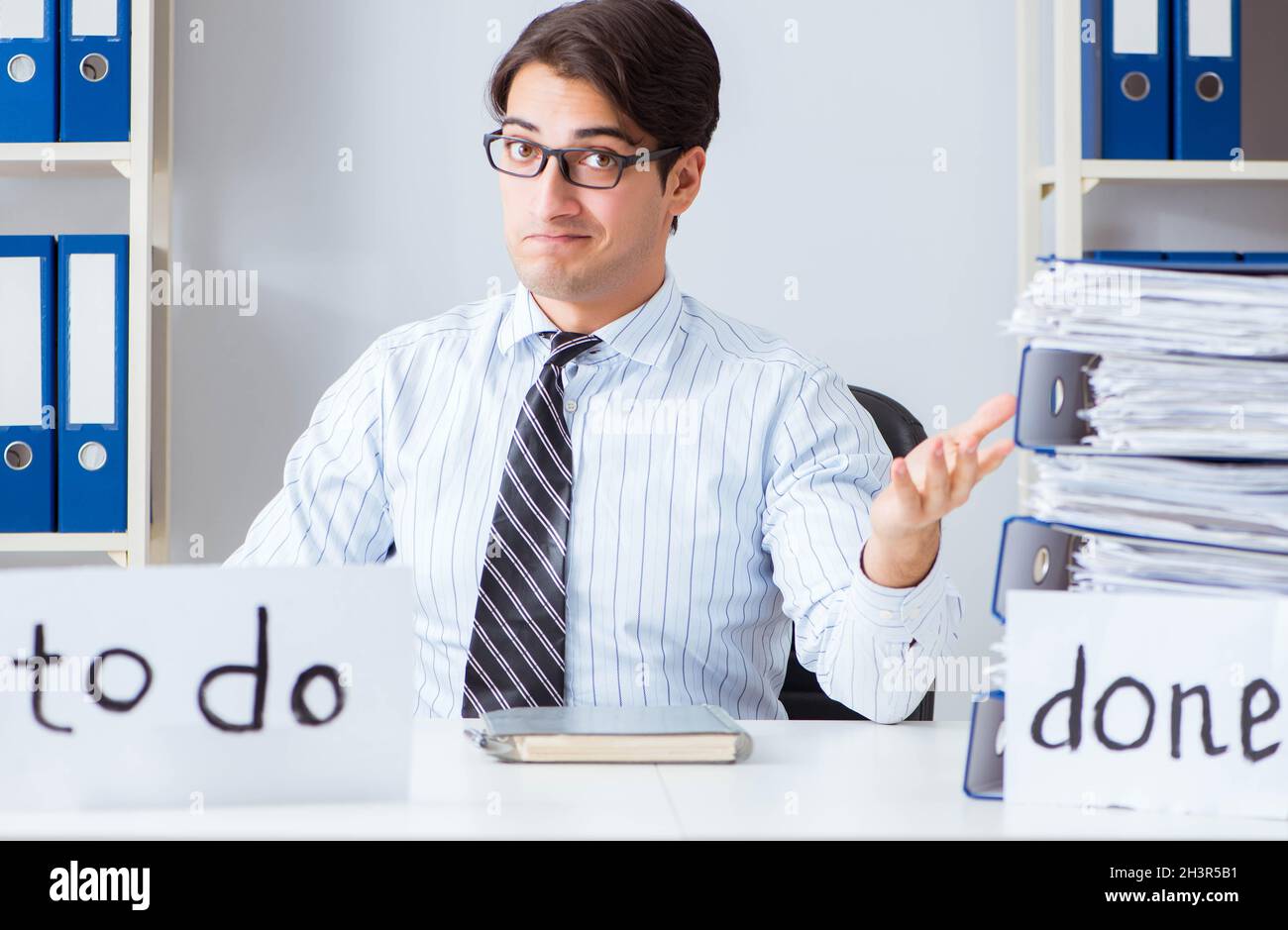 Businessman showing calendar hi-res stock photography and images - Alamy
