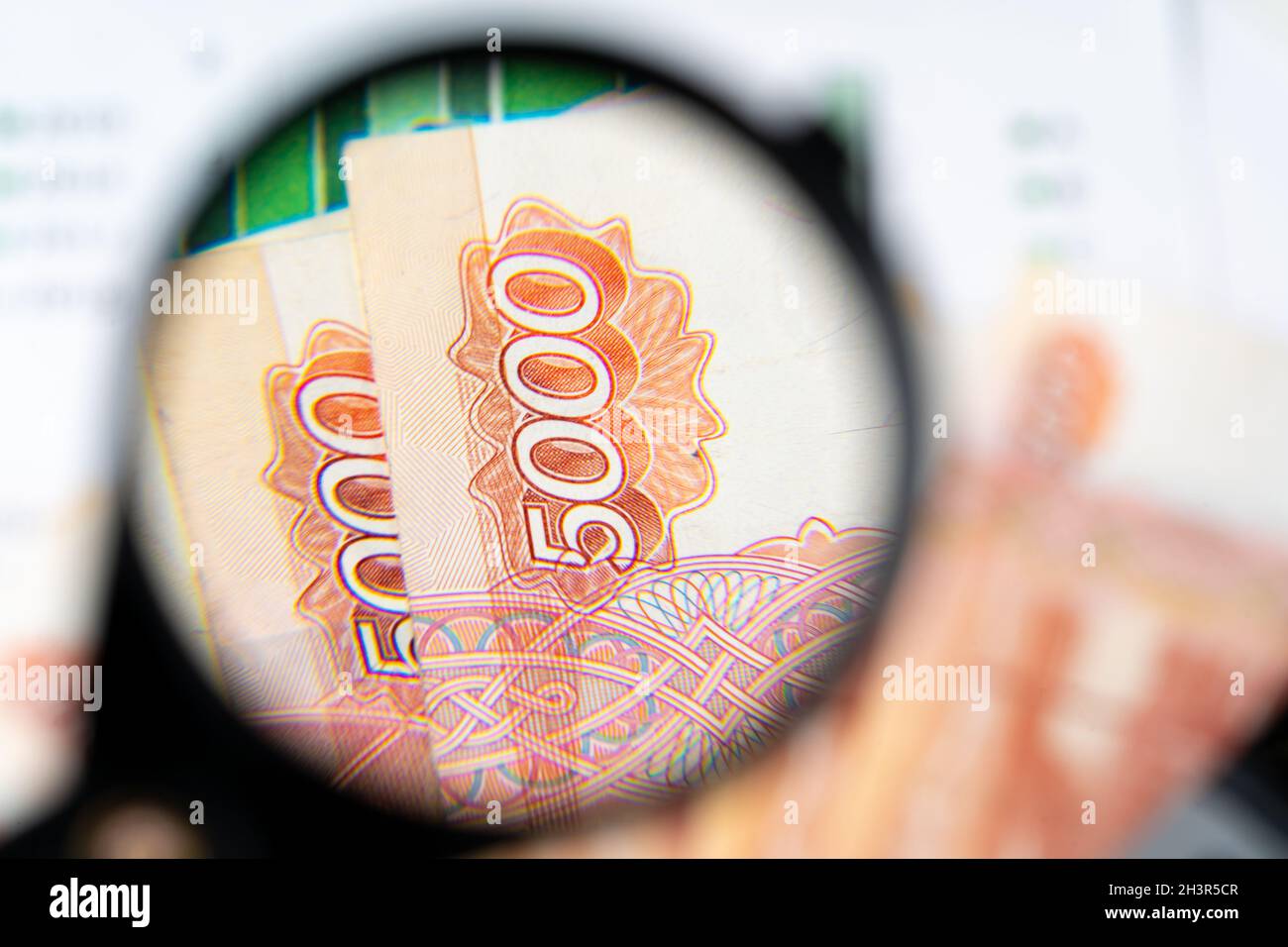 Magnifying Glass on the Russian Currency Rubles Stock Photo - Alamy