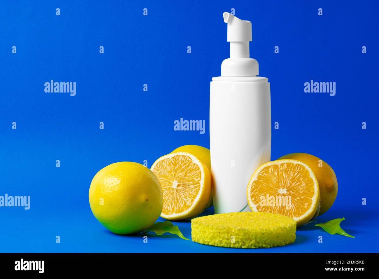 Bottle of skincare cosmetics with sliced lemons Stock Photo - Alamy
