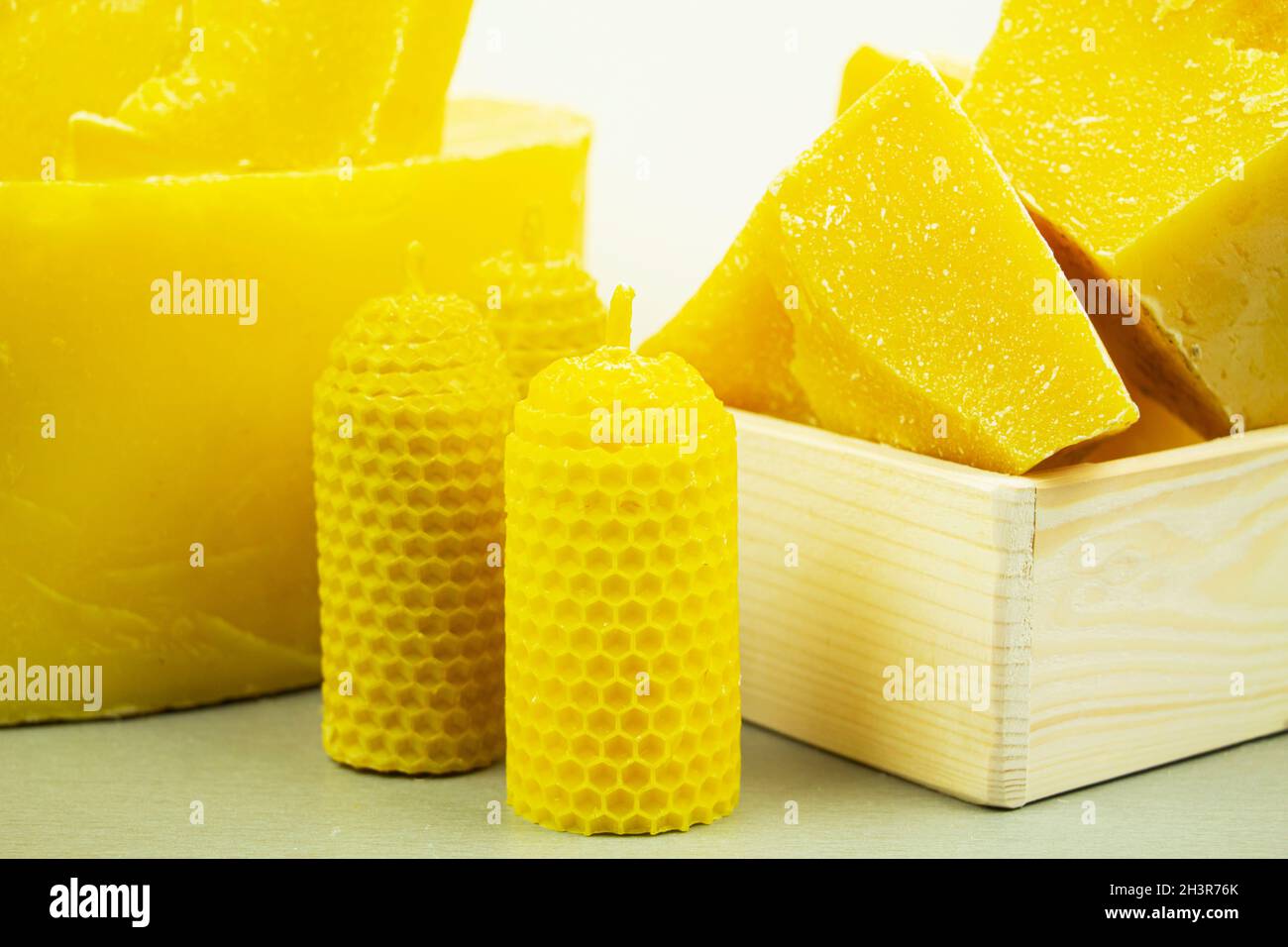 large pieces of natural beeswax, close-up, raw materials for candles ...