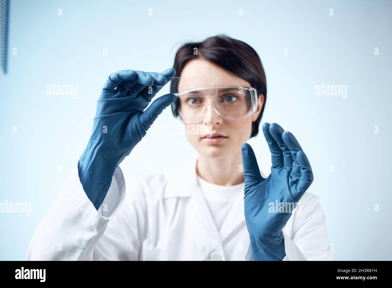 laboratory assistant chemical solutions biologist research study light ...