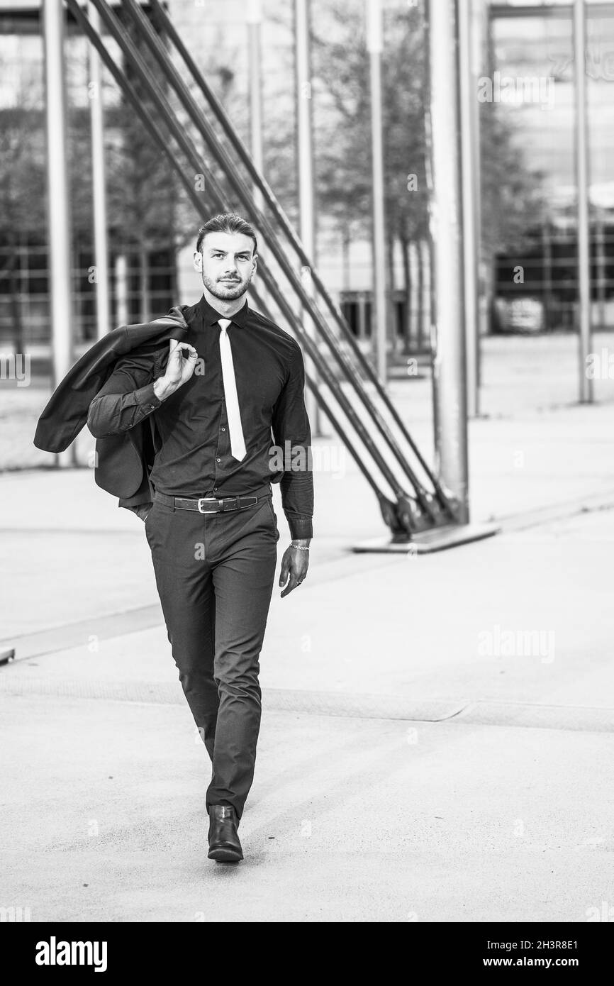 Young male worker posing Black and White Stock Photos & Images - Alamy