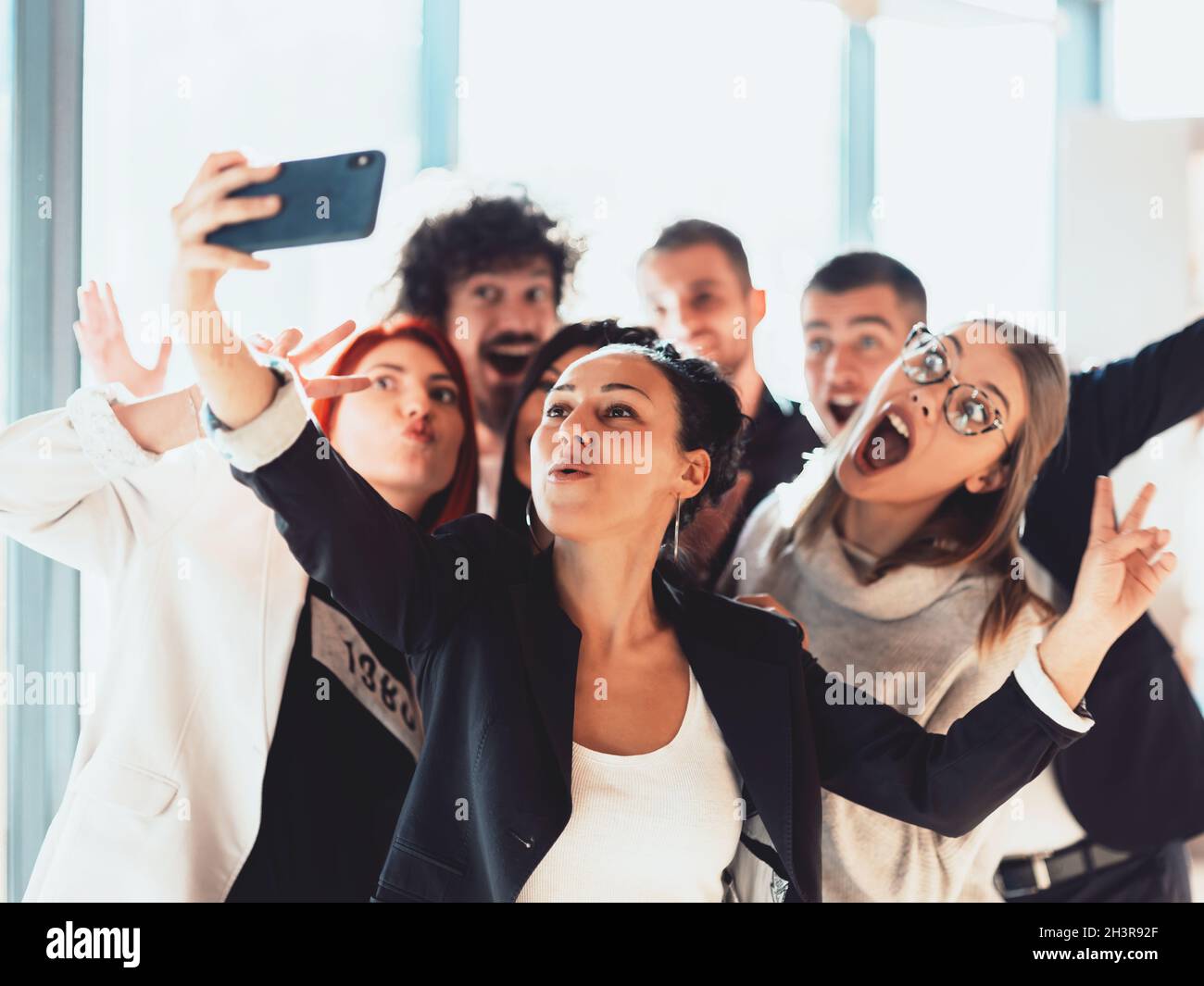 Happy laughing team diverse colleagues posing for selfie portrait in ...