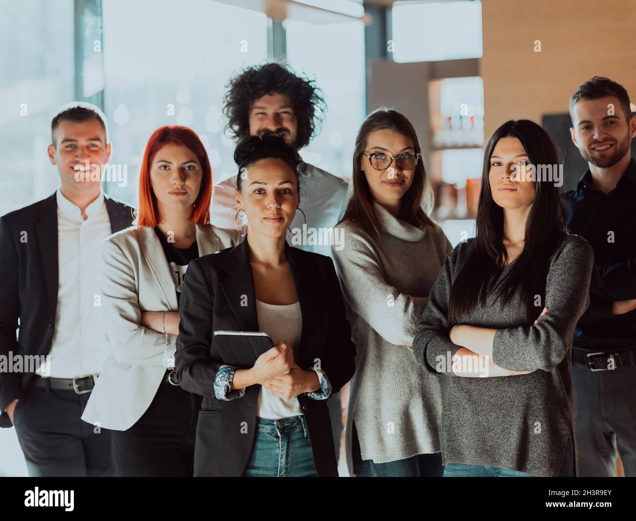 Young Smiling Managers Standing in Modern Office. Training in Office ...