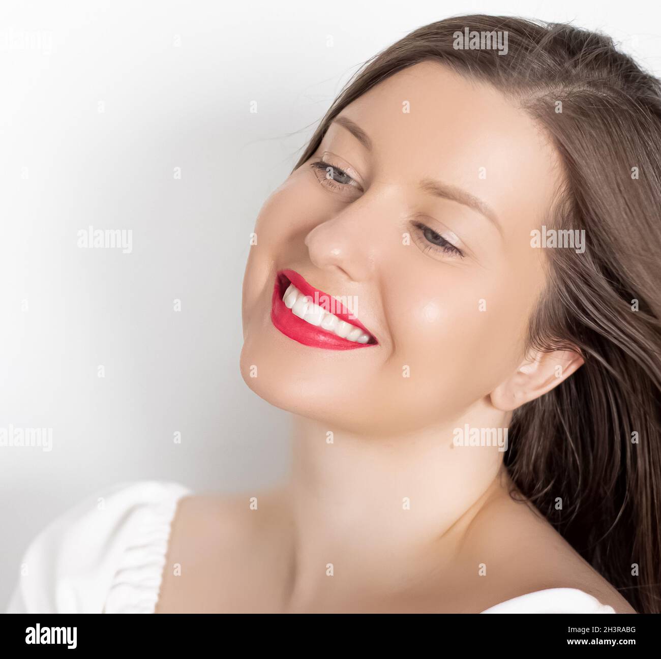 Happy smiling young woman with perfect white teeth and beautiful ...
