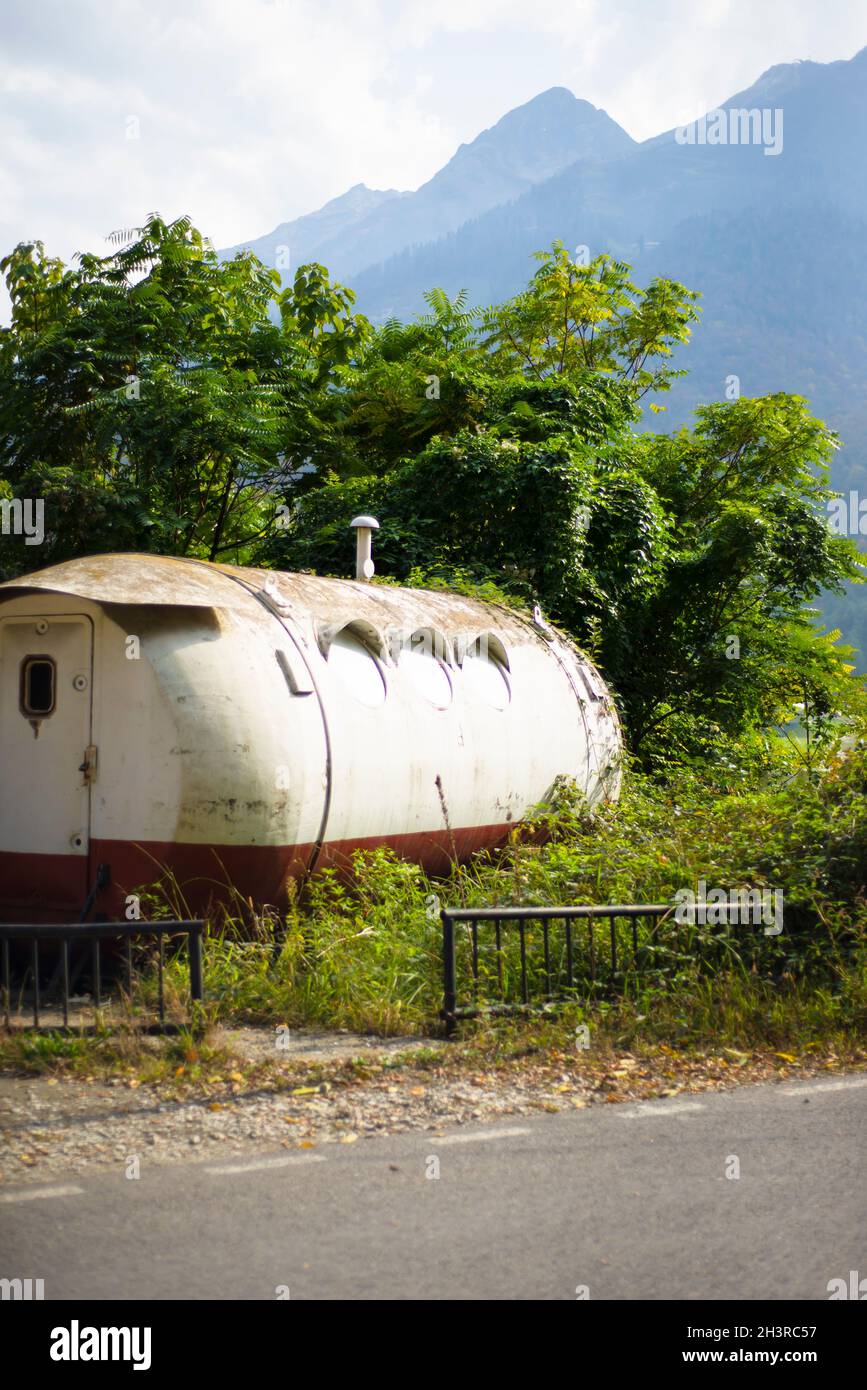 Cistern-house in the highlands. The mountains. Forest. Old cistern with ...