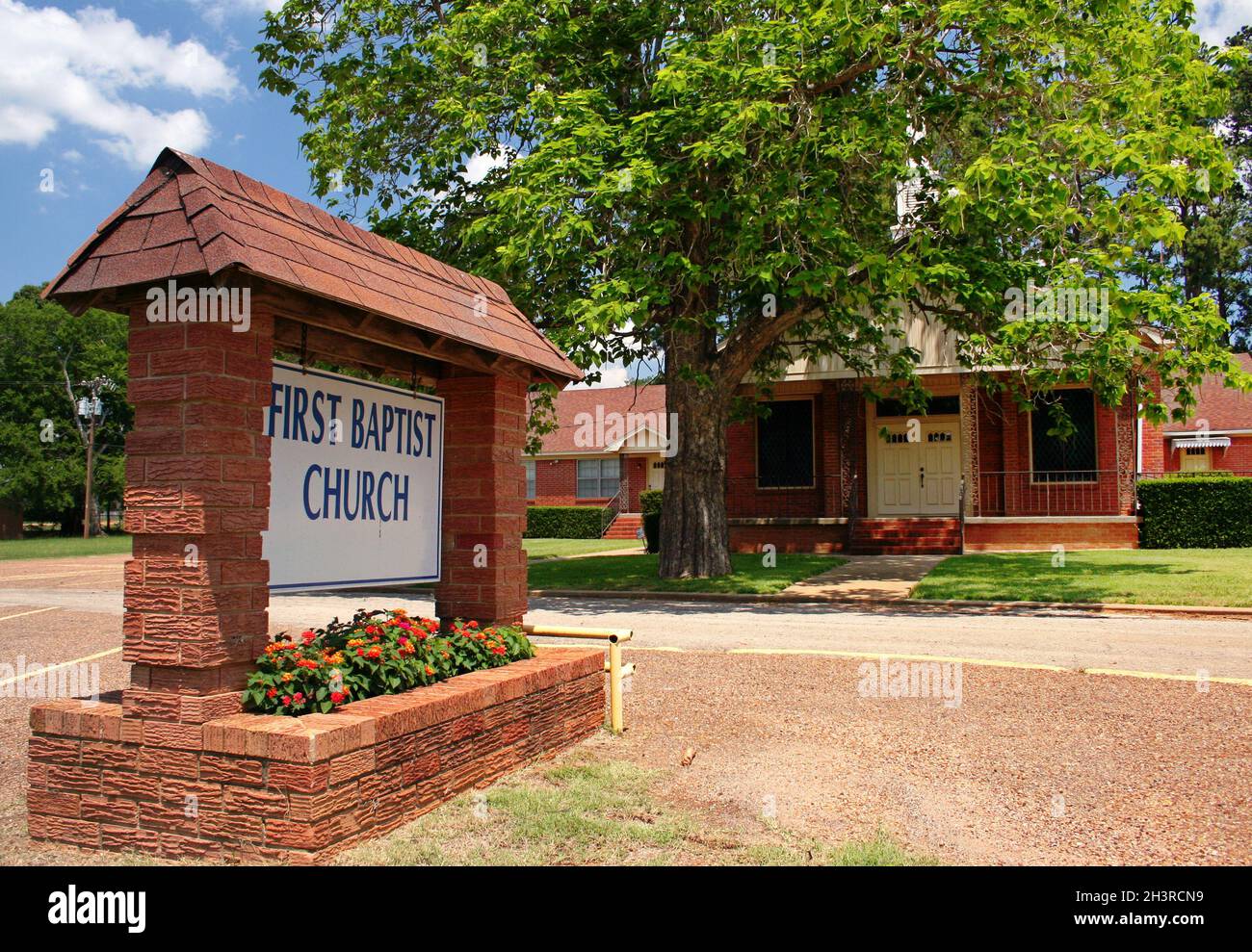 Small Rural Church With Blue Sky and Trees Stock Photo - Alamy