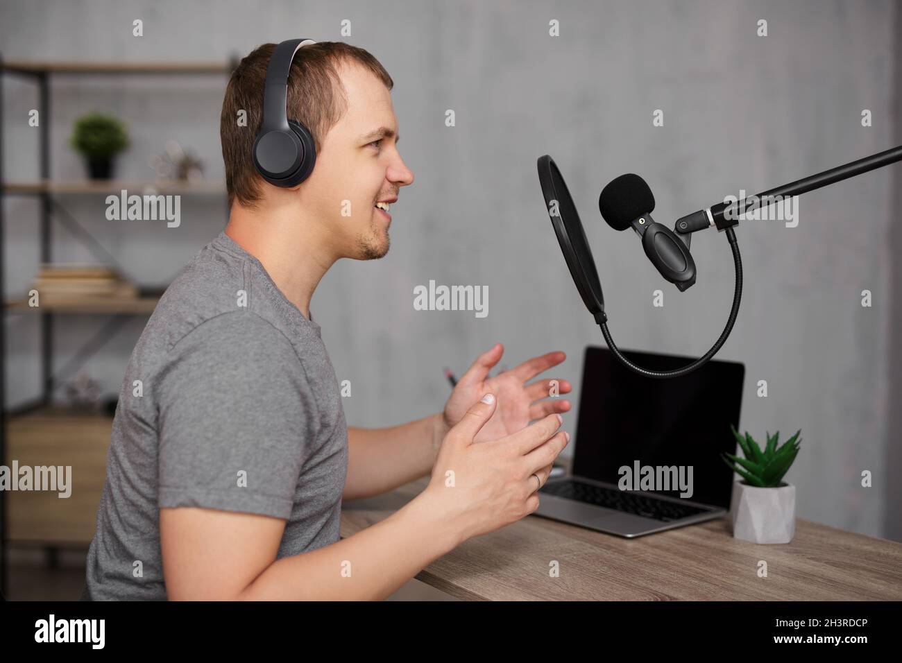 creativity, media content, podcast and blogging concept - man with ...