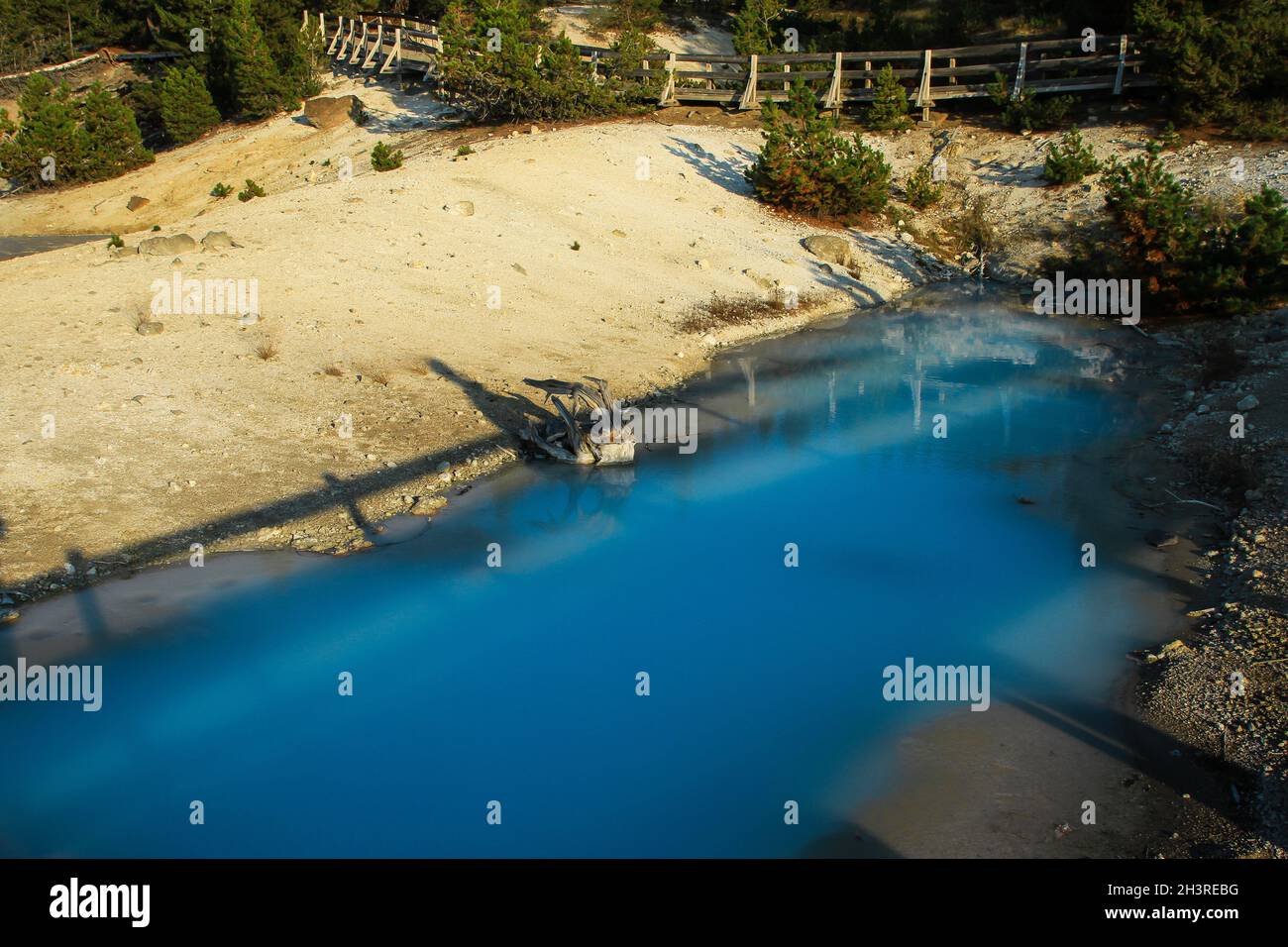 Yellowstone beautiful colorful sapphire blue water in a still stream ...