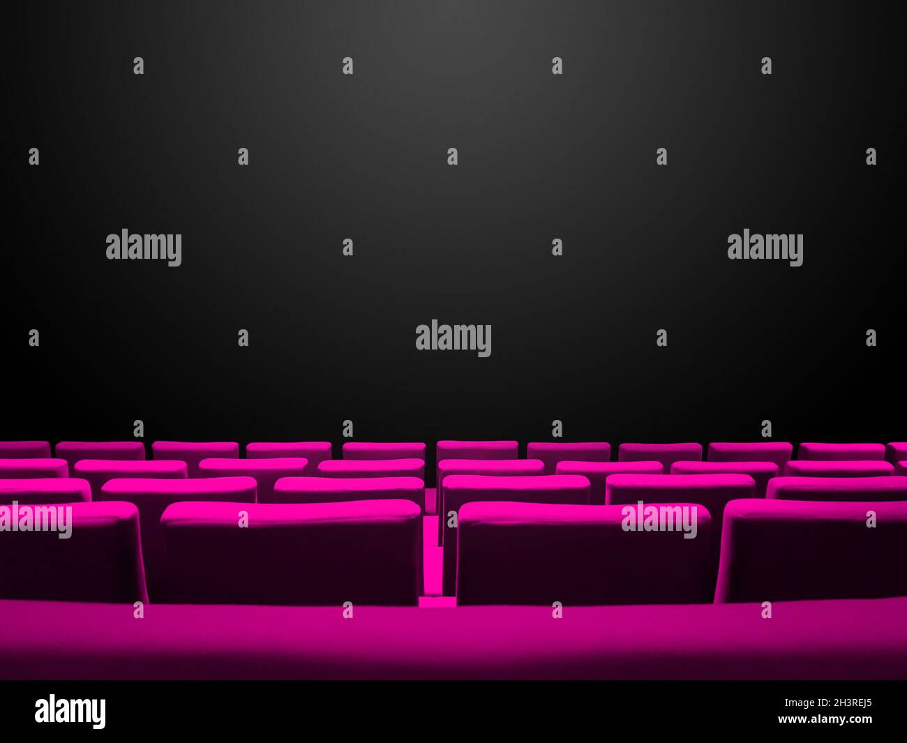 Cinema movie theatre with pink seats rows and a black background Stock ...