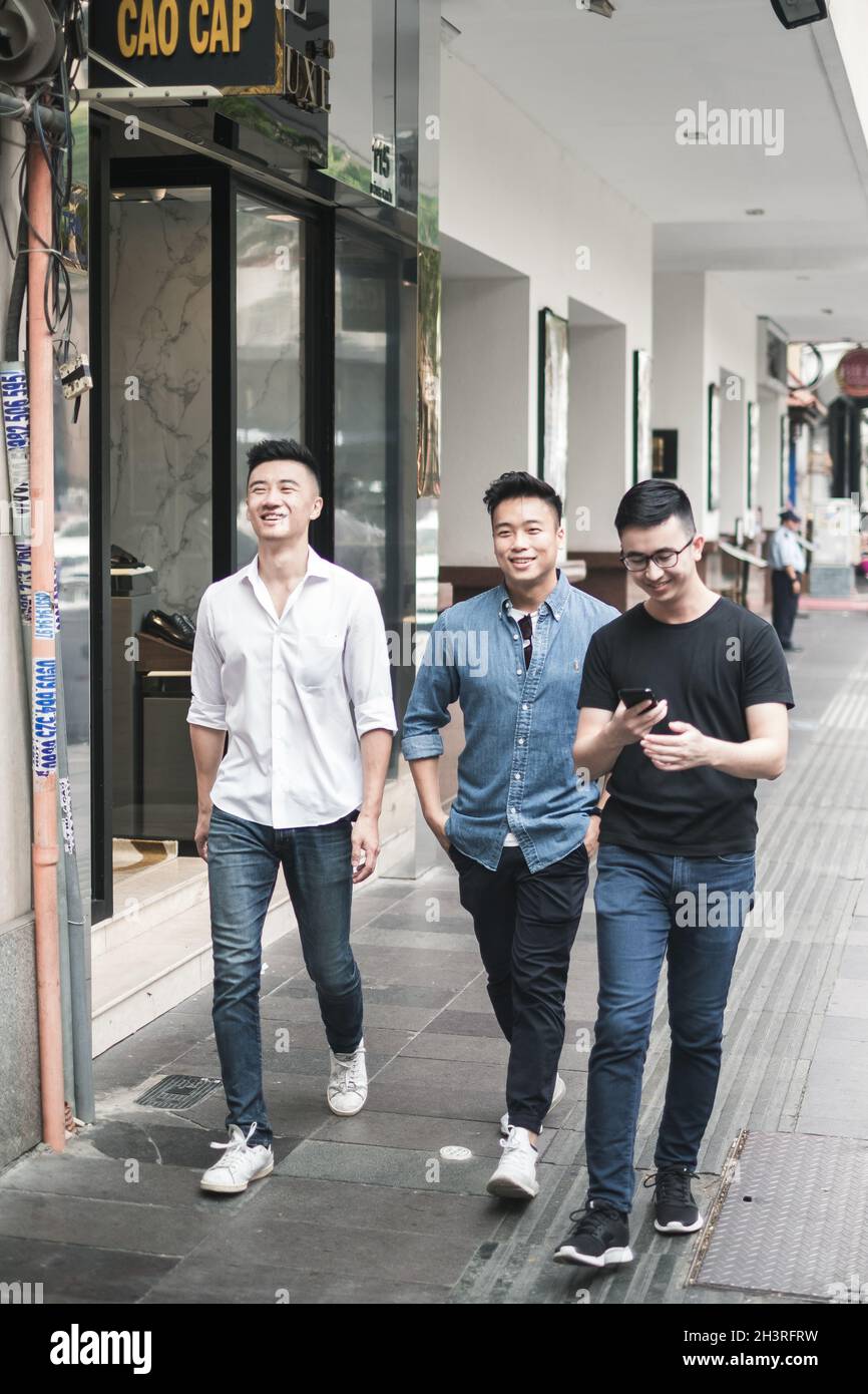 Three young chinese men hi-res stock photography and images - Alamy