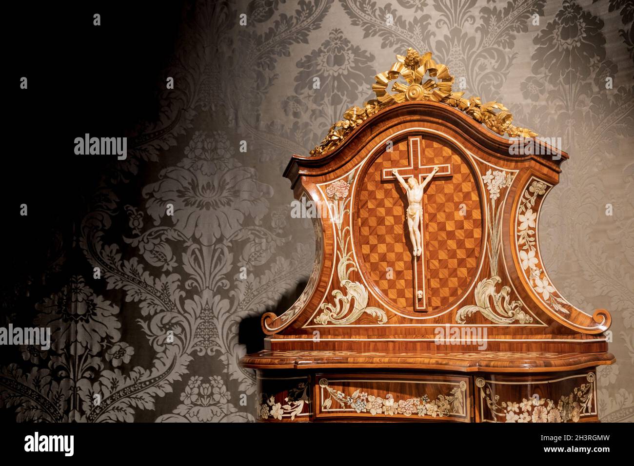 Old crucifix made of wood and ivory. Jesus Christ symbol of resurrection and life after the ...