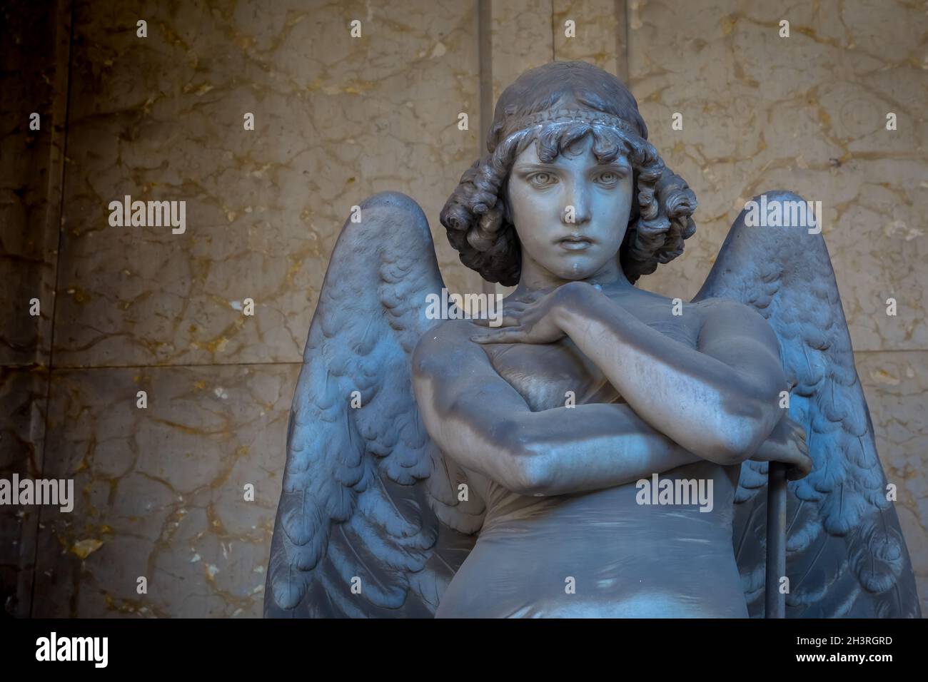 Statue of angel on an old tomb located in Genoa cemetery - Italy Stock ...