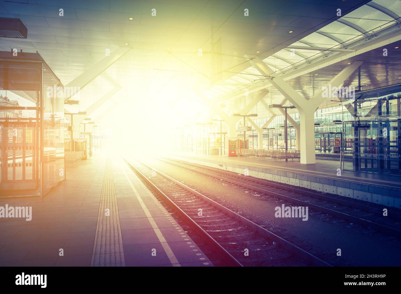 Travelling scene on a train station, public transport: rail platform or ...