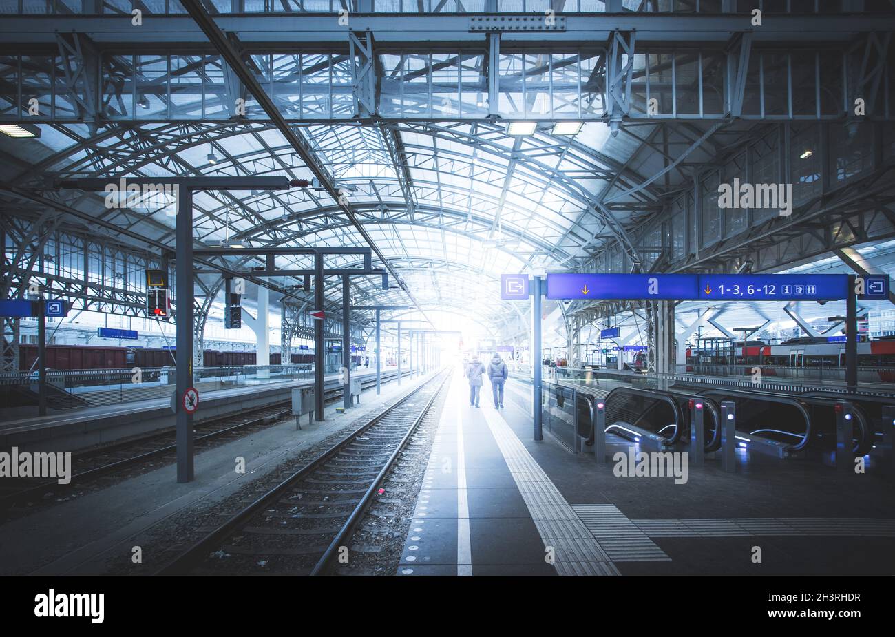 Travelling scene on a train station, public transport: rail platform or ...