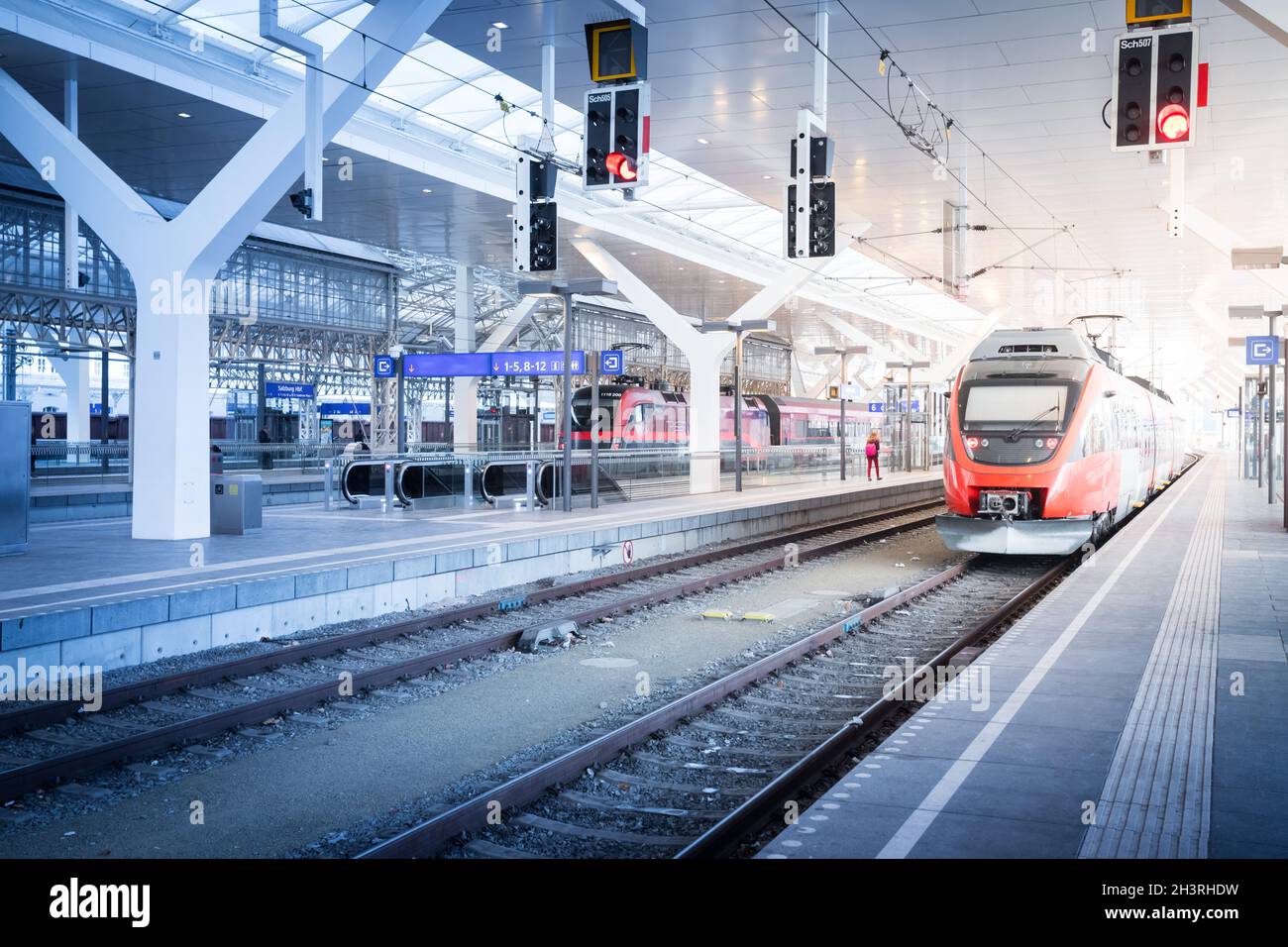 Travelling scene on a train station, public transport: rail platform or ...