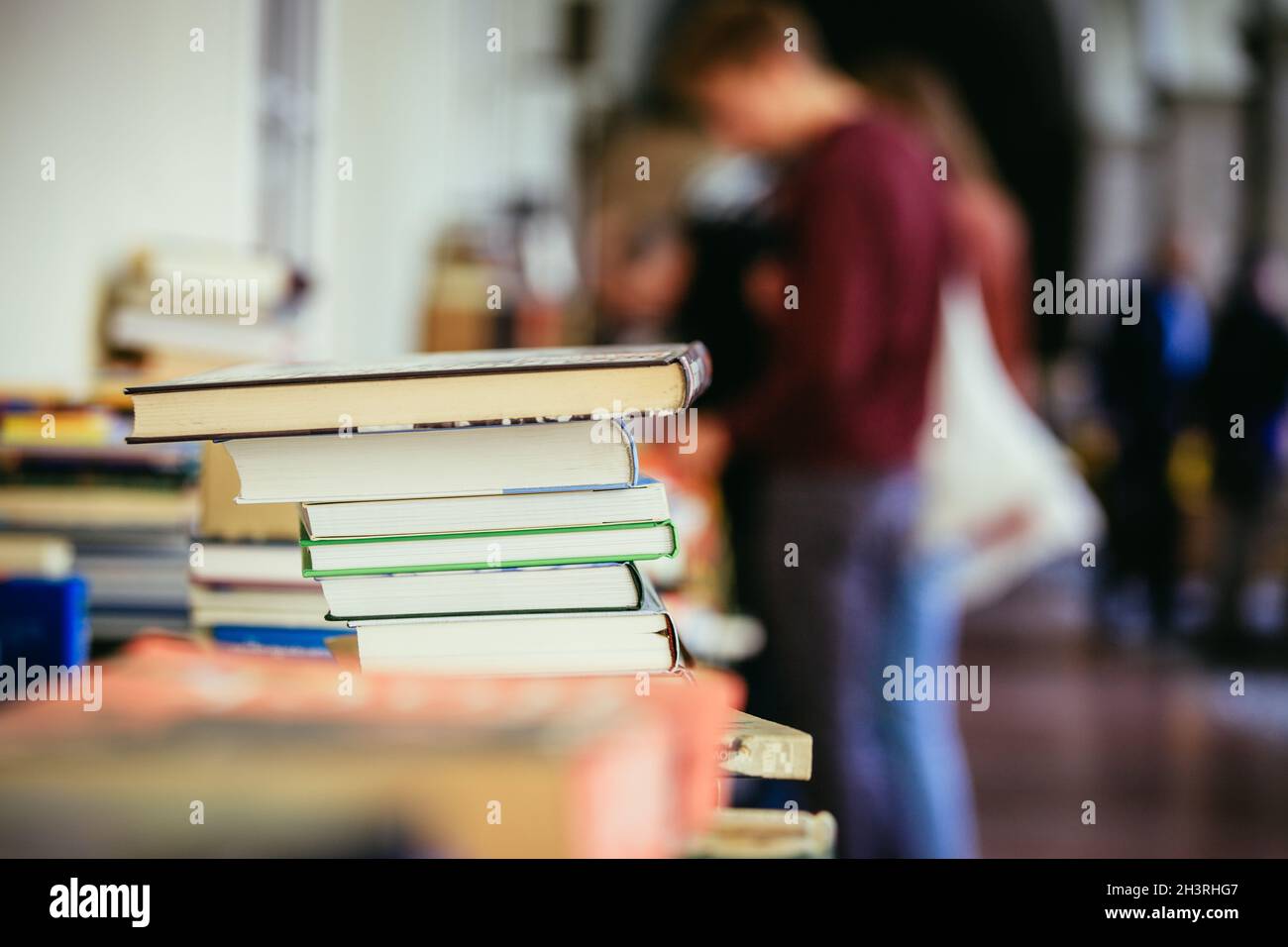 Stack of books at a charity book flea market, text space Stock Photo ...