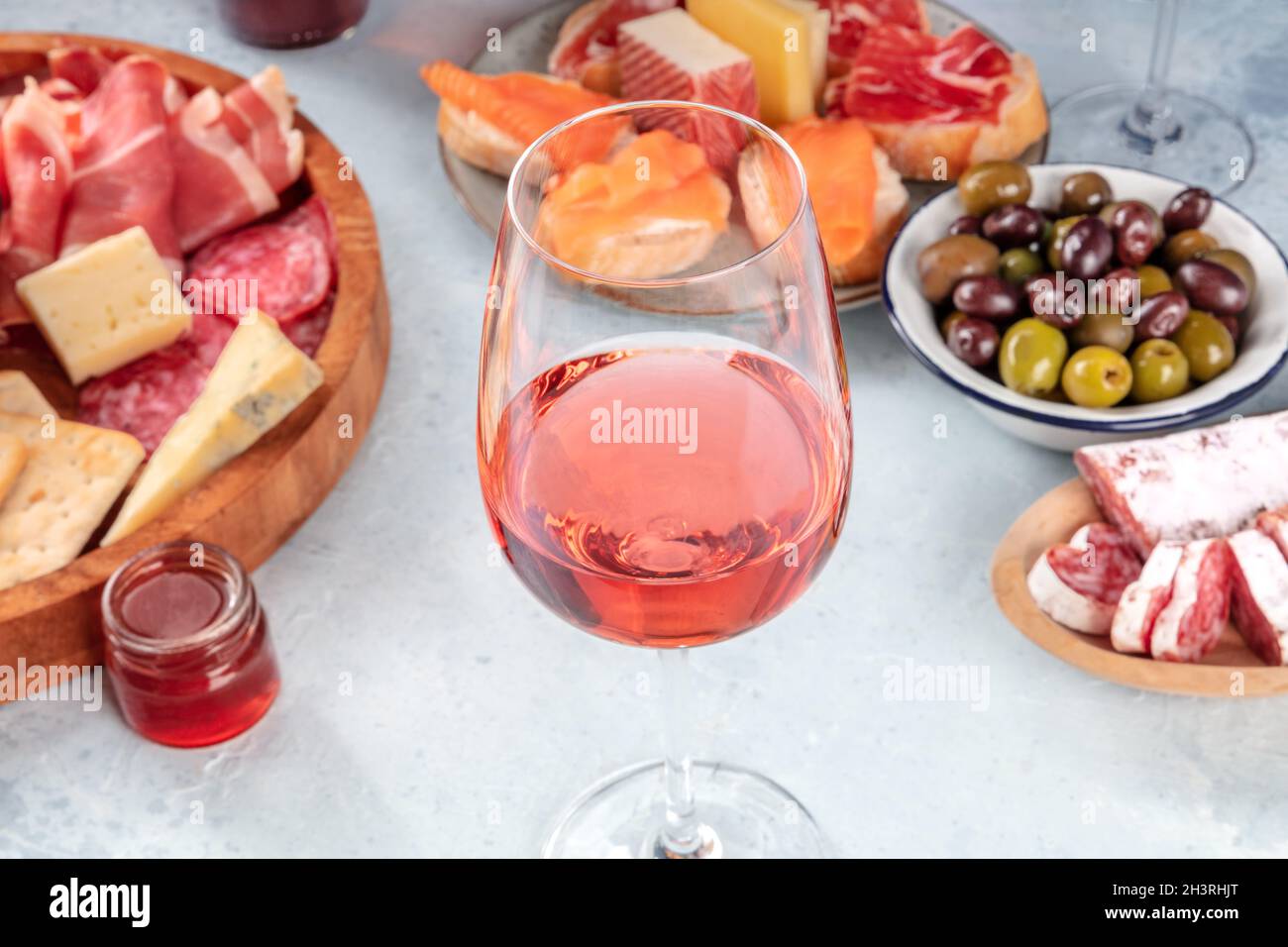 Rose wine and Italian antipasti or Spanish tapas in a bar Stock Photo ...