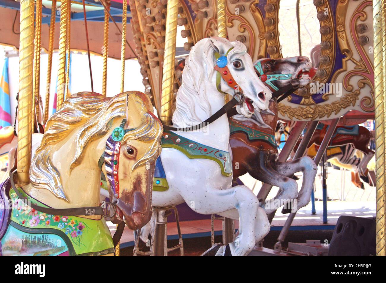 Vintage Carousel horses at rural carnival or fair Stock Photo - Alamy