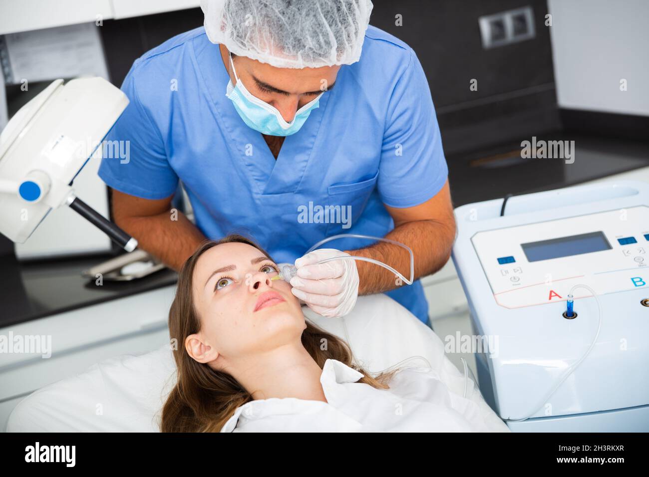 Female client getting carbon dioxide injections for face skin Stock ...