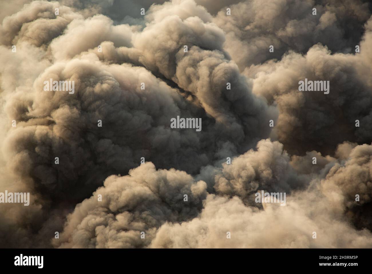 Gray smoke rising during fire Stock Photo - Alamy