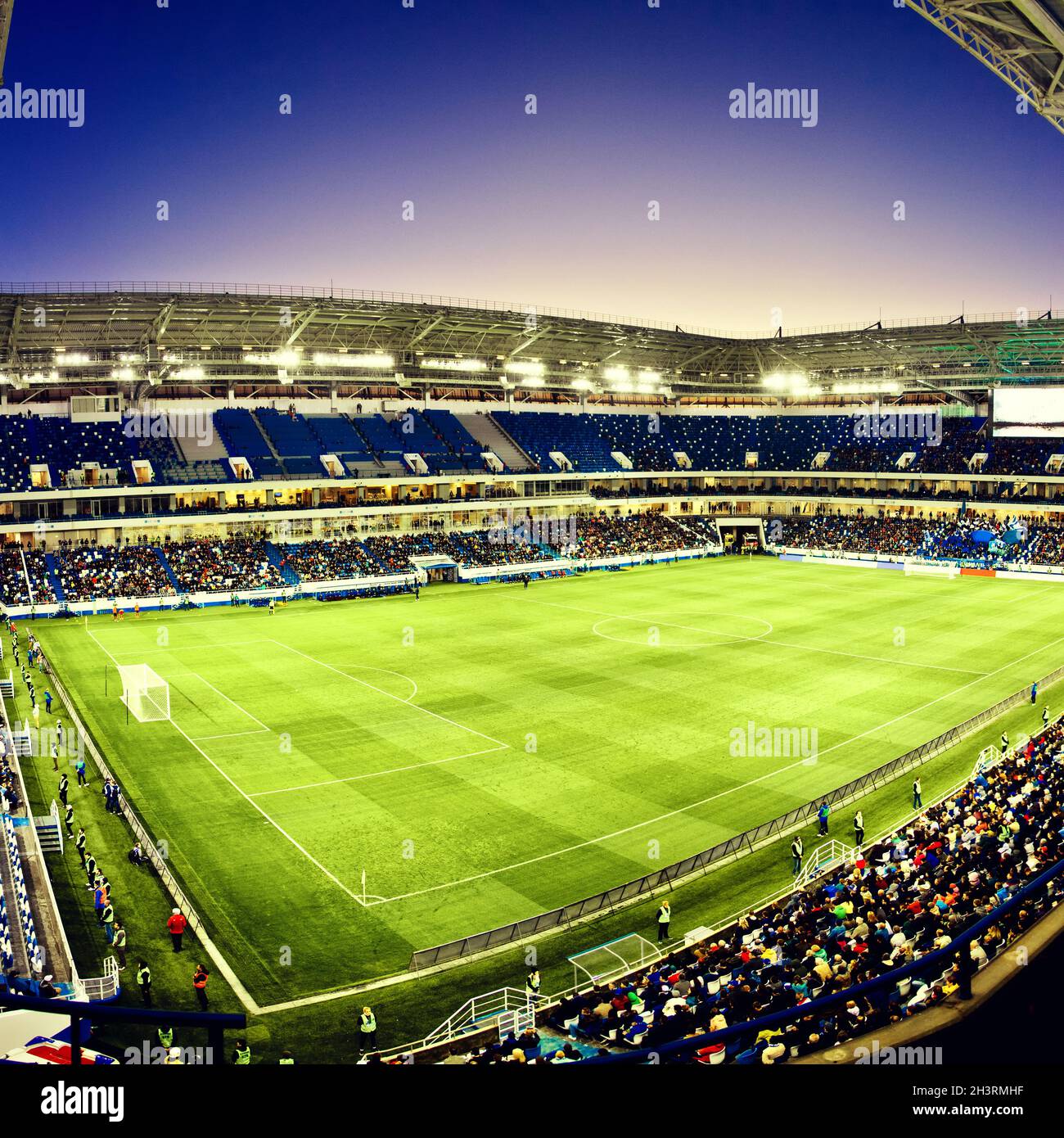 Soccer stadium arena with natural green grass Stock Photo - Alamy
