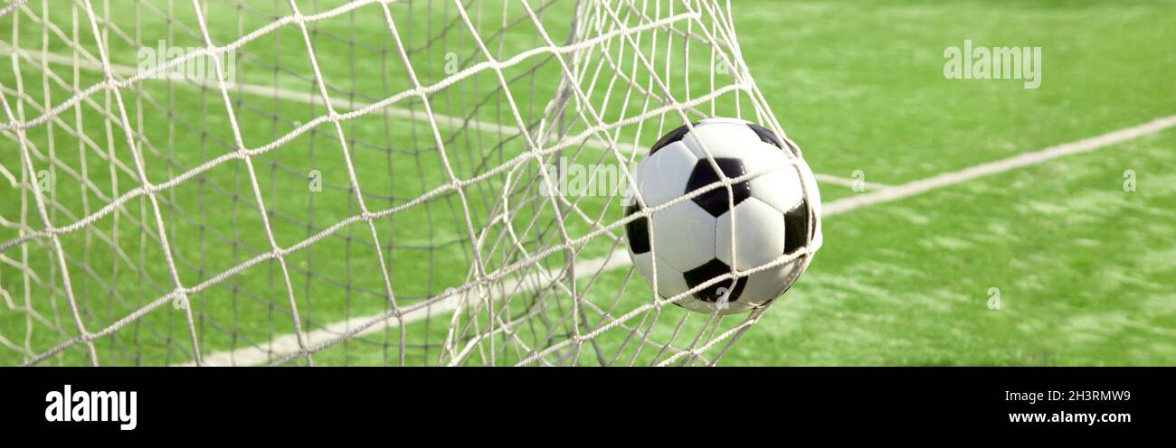 Soccer ball in the net of a goal. Soccer concept Stock Photo - Alamy