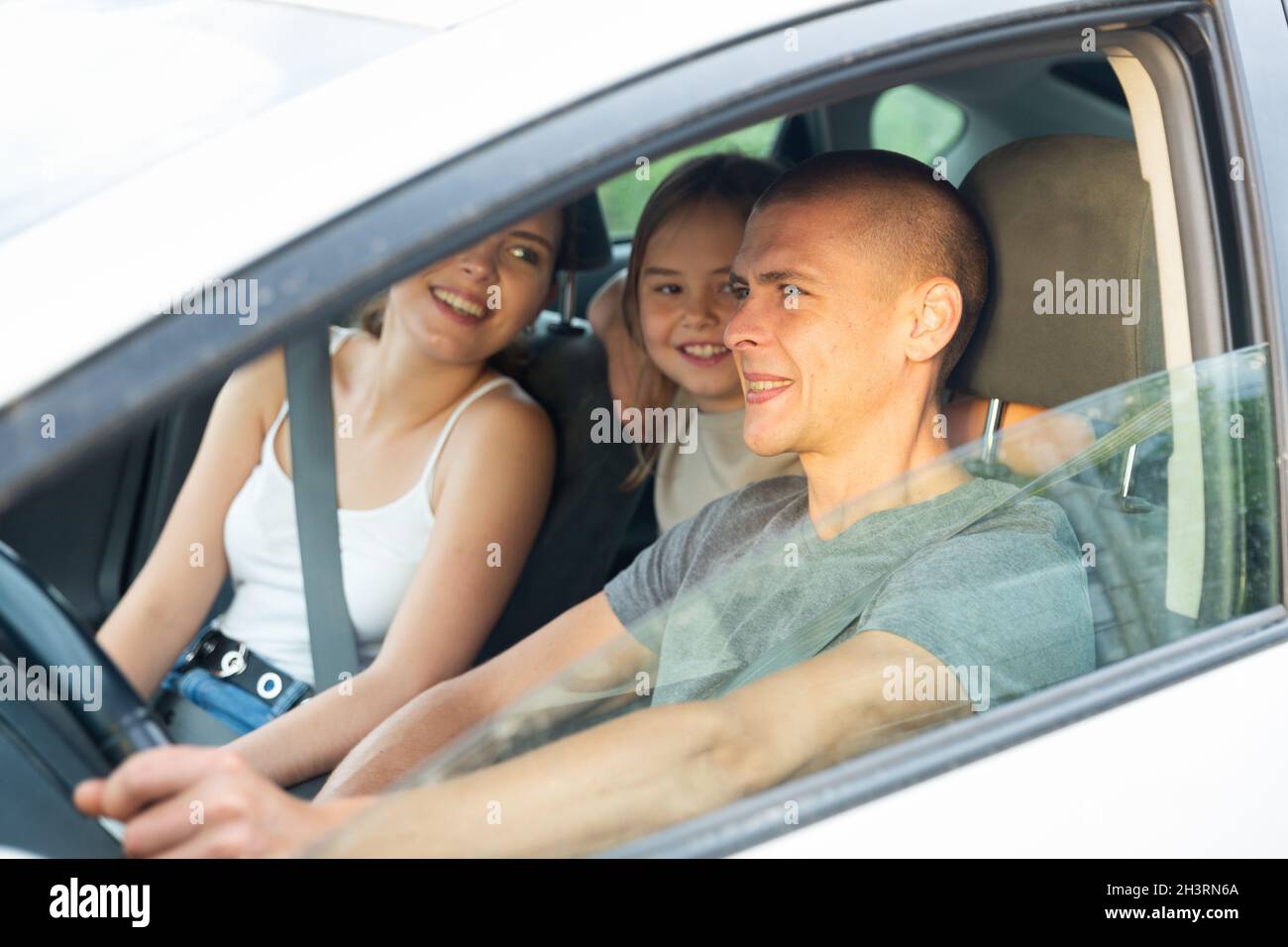 Happy family of three traveling by car hi-res stock photography and ...