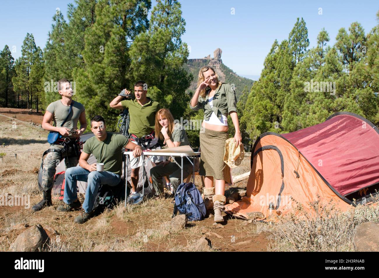 group of friends having fun on a camping trip Stock Photo - Alamy